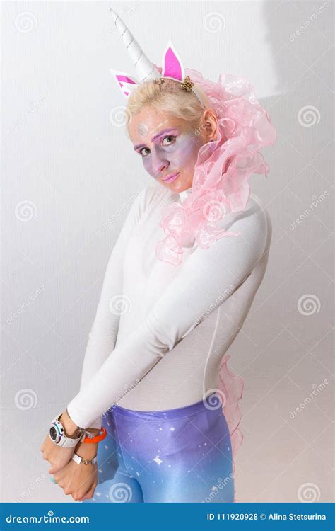 Girl With Unicorn Young Woman Hugging A Unicorn Puppet Royalty Free