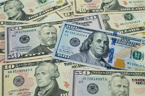 Usd Currency Many Dollar Bank Notes Placed On The Tablethe Dollar Is