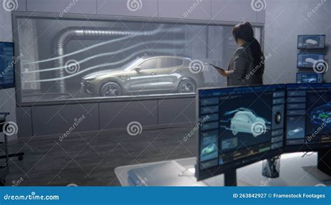 Engineers Testing The Aerodynamic Properties Of A Car In A Laboratory Stock Image Image Of