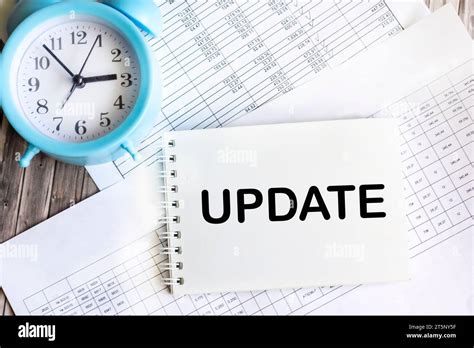 Notepad With Update Text Updating The Marketing Plan On Documents