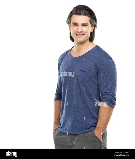 Just Your Average Guy Studio Portrait Of A Handsome Man Posing Against A White Background Stock
