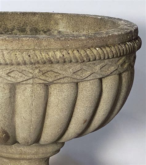 English Garden Stone Urn On Plinth In The Neo Classical Style For Sale