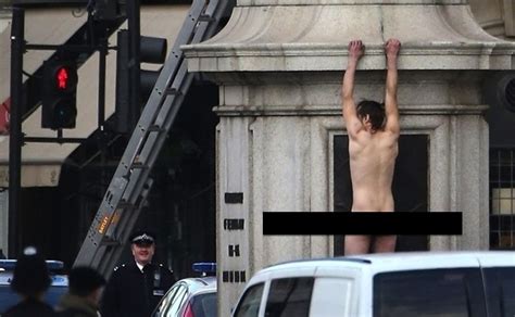 Naked Man Sits On Statue In Central London For Three Hours