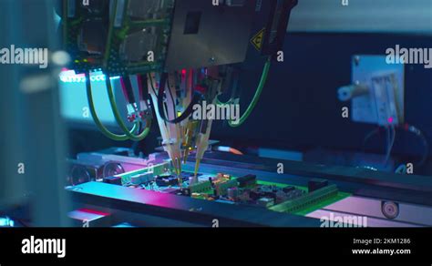 Industrial Robot For Electronics Manufacturing Makes A Complex Printed Circuit Stock Video