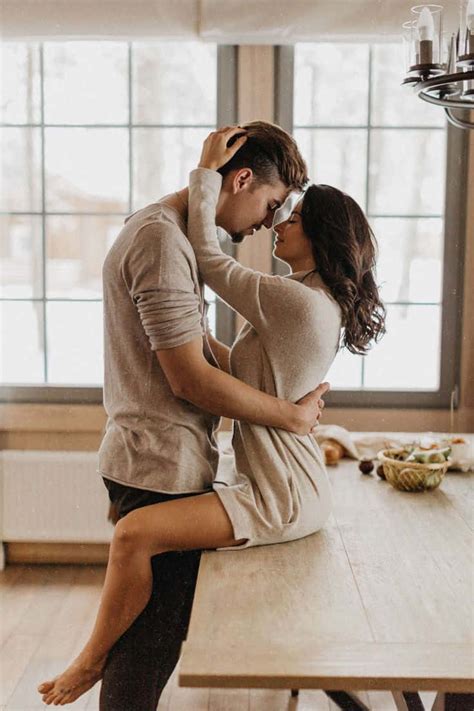Download Couple Kissing In The Kitchen Picture Wallpapers Com