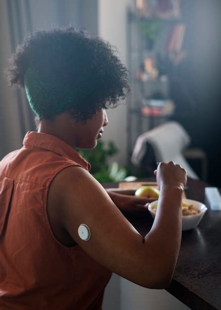 Free Photo Diabetic Woman Wearing Glucose Patch Sensor