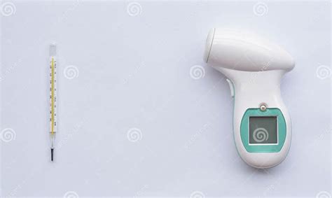 Comparison Between Mercury Glass Thermometer Versus Non Contact