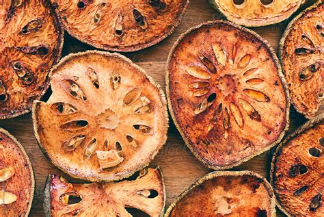 "Bael Fruit" by Stocksy Contributor "Marija Savic" - Stocksy