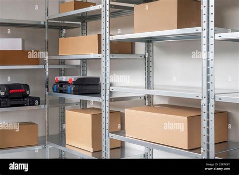 Cardboard And Plastic Tool Boxes On Silver Stainless Steel Metal