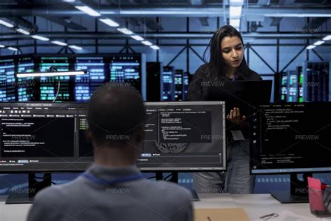 It Professionals In Server Room Deploying Error Checking Utilities