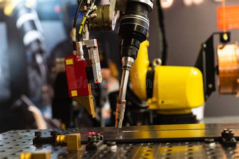 Automatic Welding Robot In A Modern Factory In Operation Stock Image Image Of Device Factory