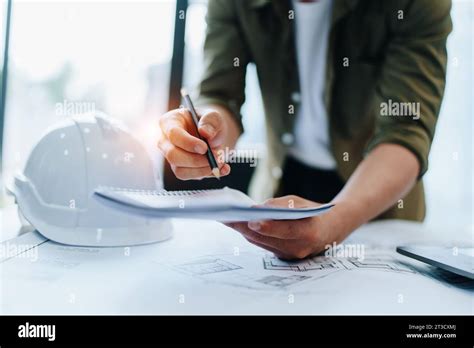 Engineering Department With Work Design Structure Building Or House Using Blueprint Computer At