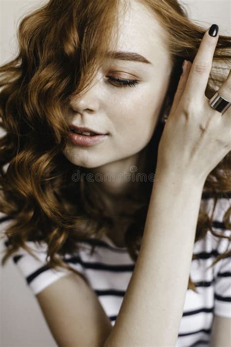 Close Up Portrait Of Sensual Ginger Lady With Brown Makeup Indoor