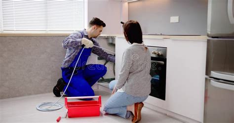 Plumber Cleaning Pipe Drain Clog Stock Photo Image Of Blocked Service