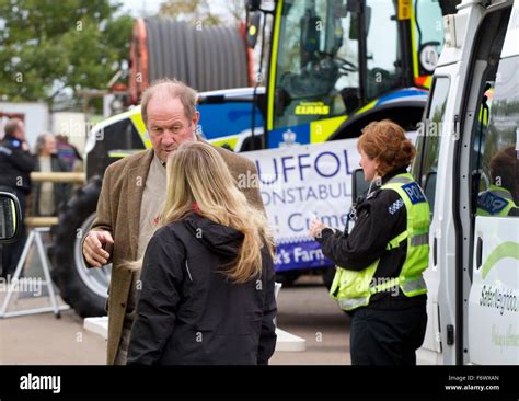 Suffolk Police And Crime Commissioner Tim Passmore Talking To A Member