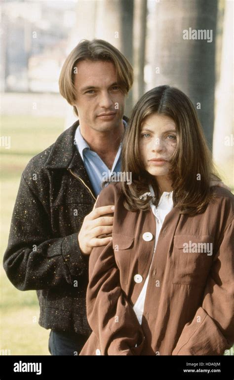 A FACE TO FOR from left James Wilder Yasmine Bleeth 1996 The Königsberg Company