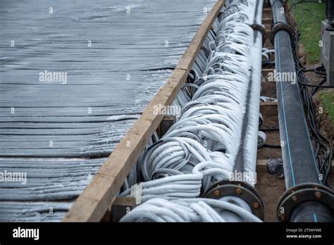Pouring With Frozen Water Of Plastic Conduit And Elastic Pipeline Of Cooling Engineering System