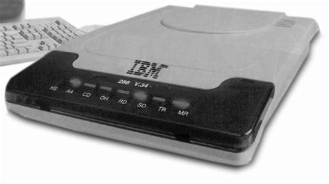 Bantu Tribesman Uses IBM Global Uplink Network Modem To Crush Nut