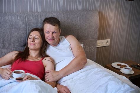 Married Couple Enjoying Morning Coffee In Bed Stock Image Image Of Rent Adult