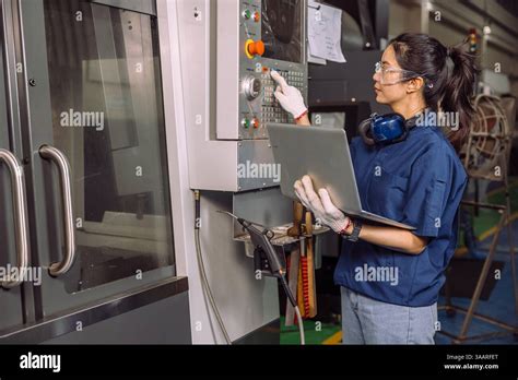 Engineer Women Working In Lathe Shop With Digital Cnc Metal Lathe