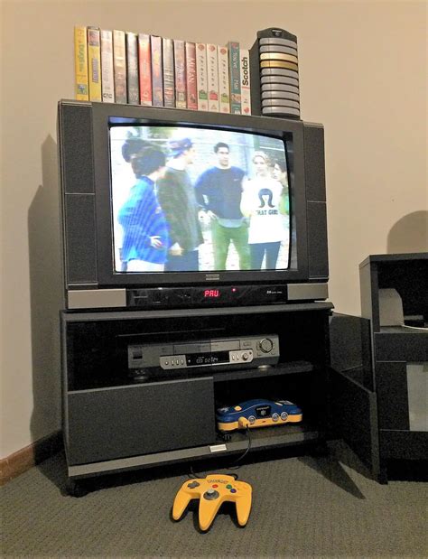 90s Tv Cabinet I Remember Needing To Push On The Glass Doors To Open