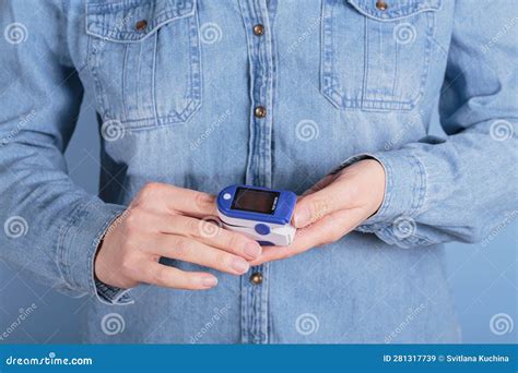 Woman Self Testing For Blood Oxygen Levels From Pulse Oximeter Stock Image Image Of Measure