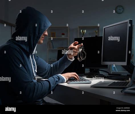 The Hacker Hacking Computer At Night Stock Photo Alamy