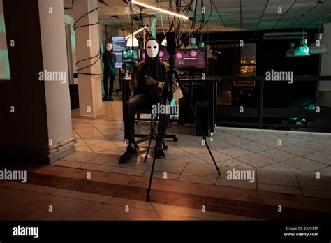 Ransomware Cyber Criminal Recording Threat Video On Smartphone Asking Money For Ransom