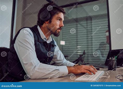 Headphones Programmer Keyboard And Man Typing Coding Or Programming Online At Night