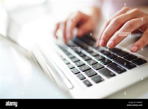 Fingers Of Female Over Laptop Keypad Stock Photo Alamy