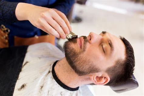 Premium Photo Grooming And People Concept Man And Barber With
