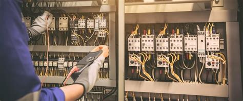 Premium Photo Close Up Hand Of Electrical Engineering Using Measuring To Checking Electricity