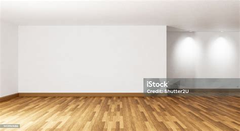 쪽모이 세공 마루 나무 바닥 다운 라이트와 흰색 콘크리트 벽 배경이있는 빈 방 건축 및 인테리어 개념 3d 그림 렌더링 가정의