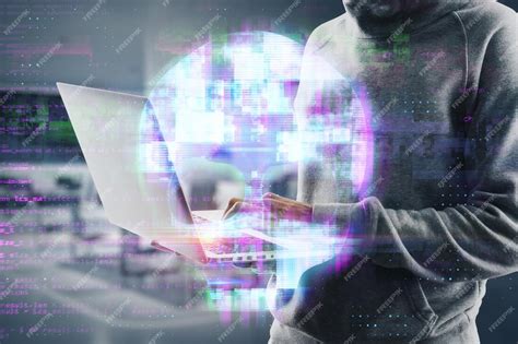 Premium Photo Hacker Hands Using Laptop With Abstract Digital Skull Hologram On Blurry Office