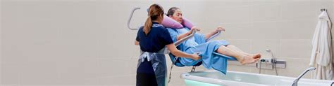 Bath Hoists Bathtub Lifts And Bathtub Chair Lift Arjo
