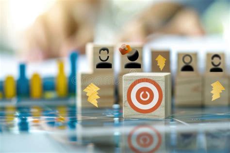 Hand Stacking Wooden Blocks With Icons Representing Teamwork Leadership And Business Strategy