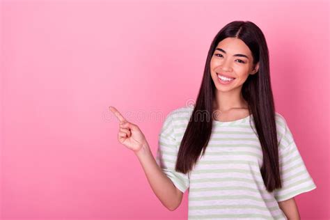 Portrait Of Pretty Positive Filipino Girl Toothy Smile Indicate Finger