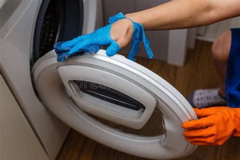 Hand In Torn Glove Cleaning The Washing Machine Regular Clean Up Maid