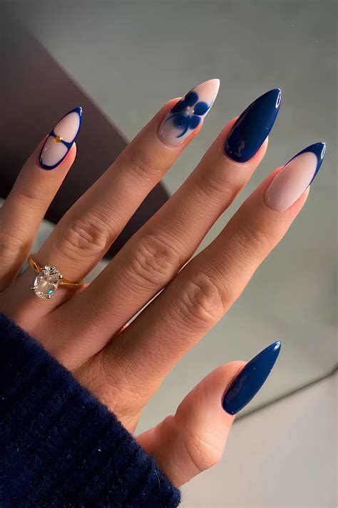 Red Nails With Blue Flowers