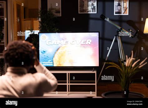 Angry Man Upset After Losing Sf Game On Gaming Console Feeling Annoyed