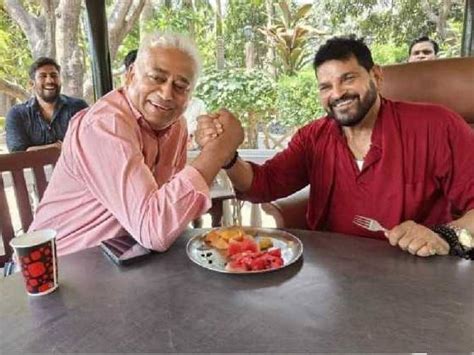 rajdeep sardesai says sorry for putting up arm wrestling picture with