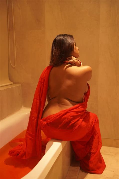 Chandrika Desai Sitting On A Bathtub And Shows Her Naked Side Boobs And Behind In A Braless Red
