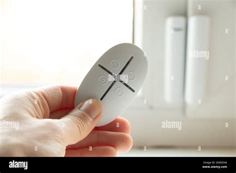 home security system on the windows an opening sensor and a remote