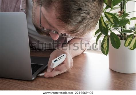 Man Connects Memory Reading Card Reader Stock Photo