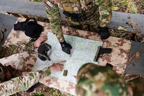 A Highly Trained Military Unit Strategizes And Organizes A Tactical