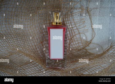 Red Fragrance Perfume Bottle With White Blank Rectangle And Gold Cap