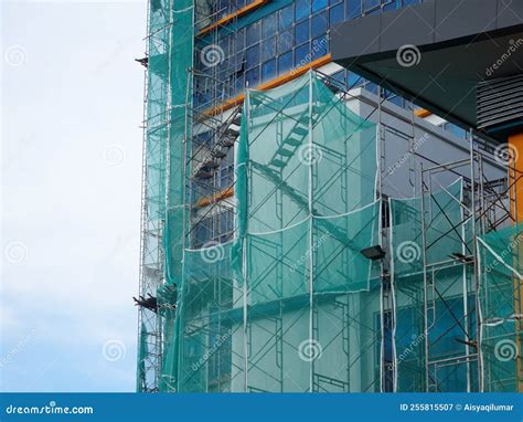 Metal Scaffolding Is Used As A Temporary Structure That Supports Works At The Construction Site