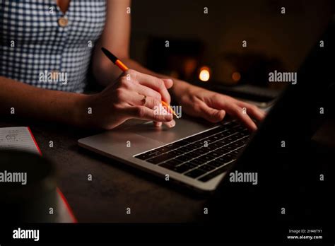 Caucasian Female Typing On Laptop Studying For Exams Late At Night Stock Photo Alamy