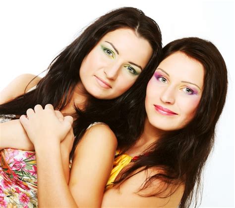 Premium Photo Two Girl Friends Together Smiling