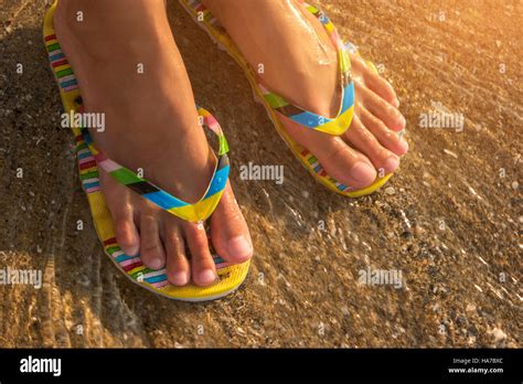 Girl S Feet In Flip Flops Stock Photo Alamy